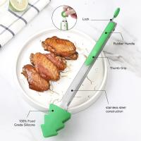 China Christmas Tree Shape Barbecue Food Tongs Heat Tolerant Material And Springy Grip for sale
