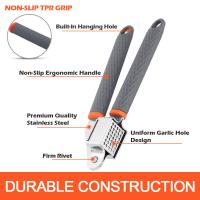 China Stainless Steel Garlic Press And Peeler Set With Non Slip Grip Rust Resistant Design for sale