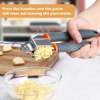 China Stainless Steel Garlic Press And Peeler Set With Non Slip Grip Rust Resistant Design for sale