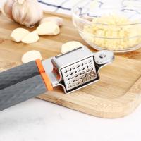 China Stainless Steel Garlic Press And Peeler Set With Non Slip Grip Rust Resistant Design for sale