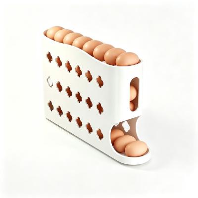China Stackable  Kitchen Rolling Egg Storage Box Fridge Egg Holder Rack for sale