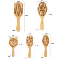 China Eco Friendly Biodegradable Bamboo Hair Brush With Wide Tooth Scalp Massage Comb for sale
