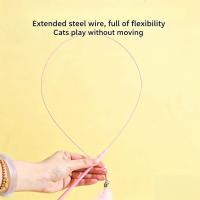 China Suction Retractable Pendant Teaser Wand Steel Wire Interactive Cat Toy With Feather for sale