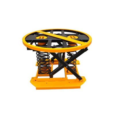 China Hydraulic Electric Rotating Pallet Lift Table 2000kg Capacity 720mm Lift Height for sale