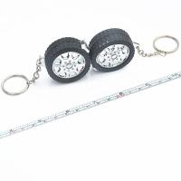 China Tire Shaped Casing Mini Steel Tape Measure Keychain Multifunctional for sale