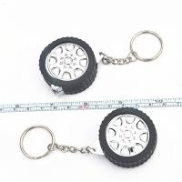 China Tire Shaped Casing Mini Steel Tape Measure Keychain Multifunctional for sale