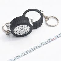 China Tire Shaped Casing Mini Steel Tape Measure Keychain Multifunctional for sale