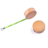 China Wintape 6ft 2m Retractable Tape Measure Maple Wood Housing Geometric Shape Steel Tape Dual Scale for sale