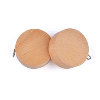 China Wintape 6ft 2m Retractable Tape Measure Maple Wood Housing Geometric Shape Steel Tape Dual Scale for sale