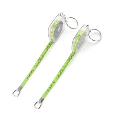 China Green Metal Measuring Tape Keychain 2 Meters 80 Inches Transparent Plastic Shell for sale