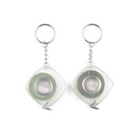 China Green Metal Measuring Tape Keychain 2 Meters 80 Inches Transparent Plastic Shell for sale