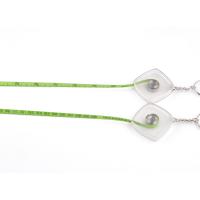 China Green Metal Measuring Tape Keychain 2 Meters 80 Inches Transparent Plastic Shell for sale