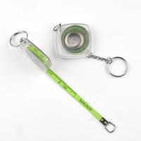 China Green Metal Measuring Tape Keychain 2 Meters 80 Inches Transparent Plastic Shell for sale