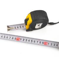China Wintape Black 8m x 25mm Metric Only Tape Measure with Spring Lock and Gripper for sale