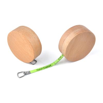China Wintape Custom Round Wooden Mini Steel Tape Measure 1m 3ft Fluorescent Green Blade for sale