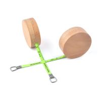 China Wintape Custom Round Wooden Mini Steel Tape Measure 1m 3ft Fluorescent Green Blade for sale