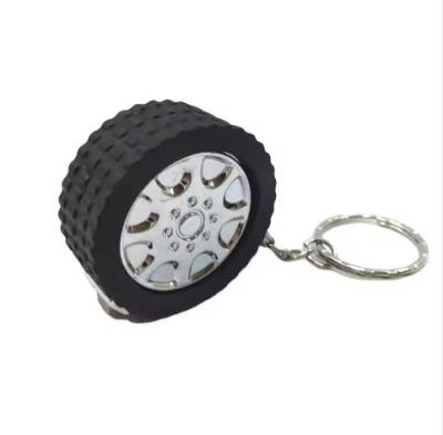 China Wintape Custom 1m Tyre Shaped Keychain Metal Tape Measure Mini Portable Soft Measuring Tape for sale