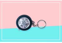 China Wintape Custom 1m Tyre Shaped Keychain Metal Tape Measure Mini Portable Soft Measuring Tape for sale