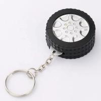 China Custom Logo Tire Shaped Mini Retractable Steel Tape Measure Keychain 1m 3ft for sale