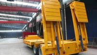 China Hydraulic Ladder 4 Axle Lowboy Trailer with 80 Ton 100 Ton Capacity and Durable Design for sale