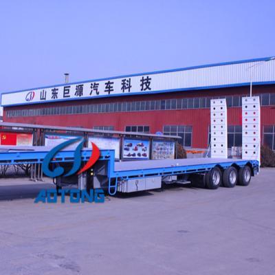 China Max Payload 120 Tons Tri-axles Heavy Duty Lowbed Semi Trailer with Ramp and Side Walls for sale