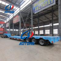 China Max Payload 120 Tons Tri-axles Heavy Duty Lowbed Semi Trailer with Ramp and Side Walls for sale