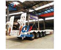 China Max Payload 120 Tons Tri-axles Heavy Duty Lowbed Semi Trailer with Ramp and Side Walls for sale