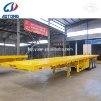 China 54000kgs Max Payload Steel 40ft 12pcs Twist Lock Container Flatbed Semi Truck Trailer for sale