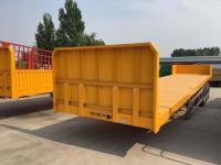 China Standard 28 Ton Landing Gear 3 Axles 20ft 40ft Flat Bed Truck Trailer for 60Ton Loading for sale
