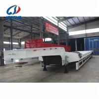 China Mechanical Suspension 18m 40ft 3 Axle Low Bed Semi Trailer for Caterpillar Excavator for sale