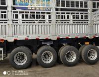 China High Loading Capacity Dry Bulk Cargo Fence Semi Trailers with 4 Axles and Lift Axle for sale