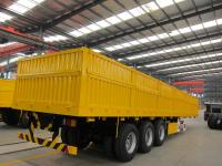 China Tri Axles Lowbed Semi Trailer with Ladder Side Wall and 28 Ton Two Speed Landing Gear for sale