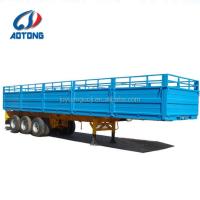 China Tri-angle 50tons drop side wall bulk cargo transporting sidewall semi trailer truck for sale