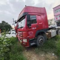 China Sinotruk Howo 6x4 Tractor Truck with Manual Transmission and HW76 Comfortable Cabin for sale