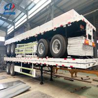 China Heavy Duty 2/3/4 Axles 40-80FT Flatbed Semi Trailer with 13T Axle Weight Load for Container Transport for sale