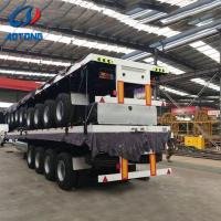 China Heavy Duty 2/3/4 Axles 40-80FT Flatbed Semi Trailer with 13T Axle Weight Load for Container Transport for sale