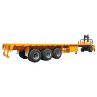 China Customized 2/3/4 Axles Flatbed Semi Trailer with Q345B Carbon Steel Main Beam and 3mm Diamond Plate Platform for 60 Ton Transport for sale