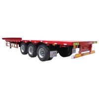 China Customized 2/3/4 Axles Flatbed Semi Trailer with Q345B Carbon Steel Main Beam and 3mm Diamond Plate Platform for 60 Ton Transport for sale