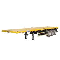 China Customized 2/3/4 Axles Flatbed Semi Trailer with Q345B Carbon Steel Main Beam and 3mm Diamond Plate Platform for 60 Ton Transport for sale