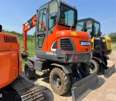 China Original Korea Used Mini Excavator Doosan DX60W-9C  6 Ton Small Wheel Excavator for sale