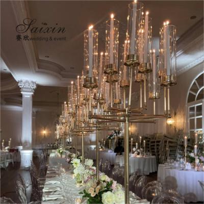 China ZT-577 12 Arms Gold Metal Candle Holder 150cm Tall Wedding Centerpiece for sale