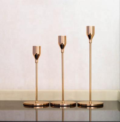 China Wholesale 3 Piece Set Rose Gold Metal Candlestick Holder 24cm 29cm 34cm for Home Wedding Decoration for sale