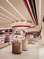 China Complete Cosmetic Shop Furniture LED Backlit Cosmetic Display Cabinet Skincare Showcase for sale