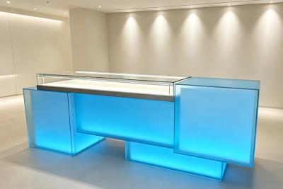 China Modern LED Blue Frosted Glass Reception Display Counter Custom For Jewelry Boutique for sale