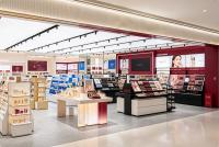 China Custom Complete Cosmetic Store Fixture With Brand Light Box Skincare & Makeup Display Cabinet for sale