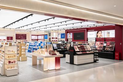 China Custom Complete Cosmetic Store Fixture With Brand Light Box Skincare & Makeup Display Cabinet for sale