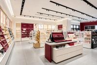 China Custom Complete Cosmetic Store Fixture With Brand Light Box Skincare & Makeup Display Cabinet for sale