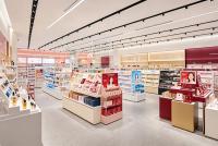 China Custom Complete Cosmetic Store Fixture With Brand Light Box Skincare & Makeup Display Cabinet for sale