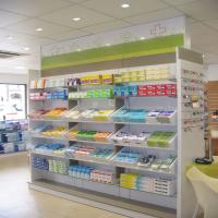 China Modern Medical Store Display Furniture and Custom Pharmacy Wall Cabinets for Retail Drugshop Interior Decoration for sale