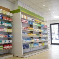 China Modern Medical Store Display Furniture and Custom Pharmacy Wall Cabinets for Retail Drugshop Interior Decoration for sale
